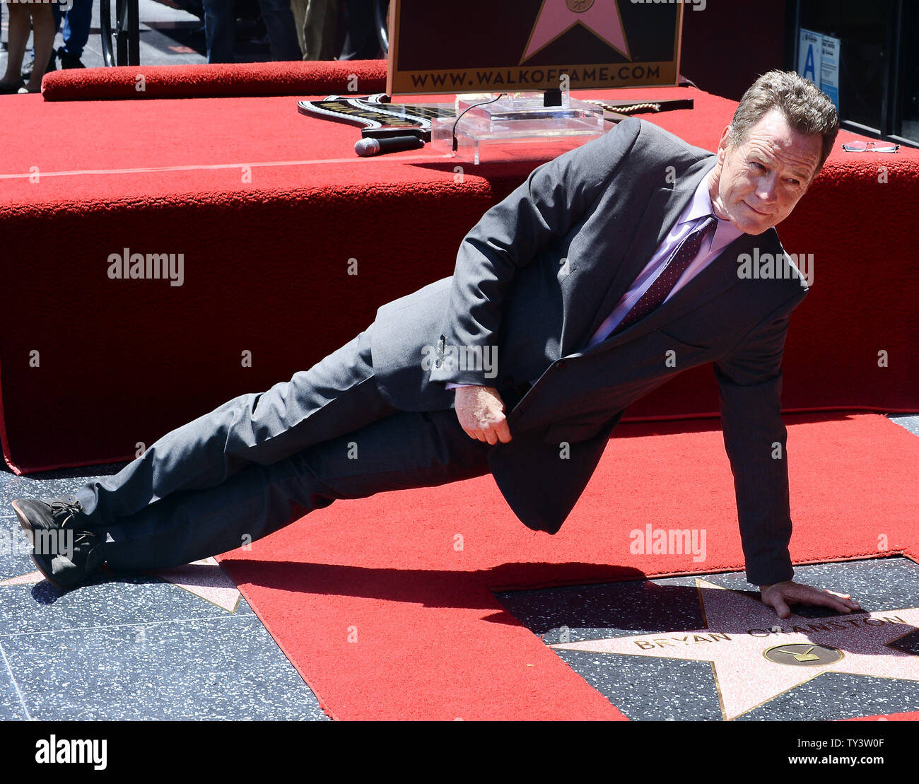 Bryan Cranston strikes a pose during an unveiling ceremony honoring him ...