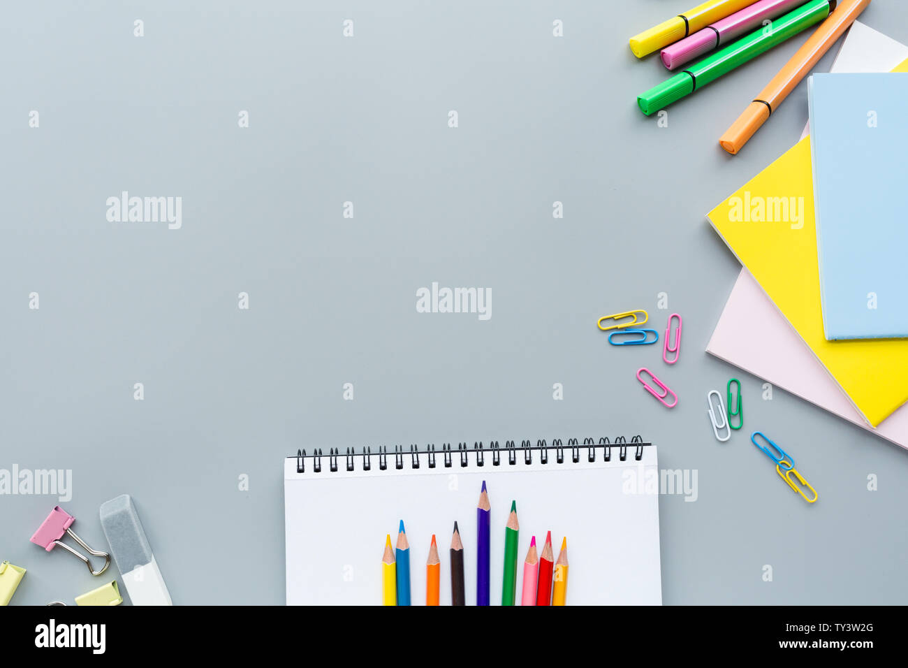 Orange back to school flat lay with bright stationery. School supplies ...