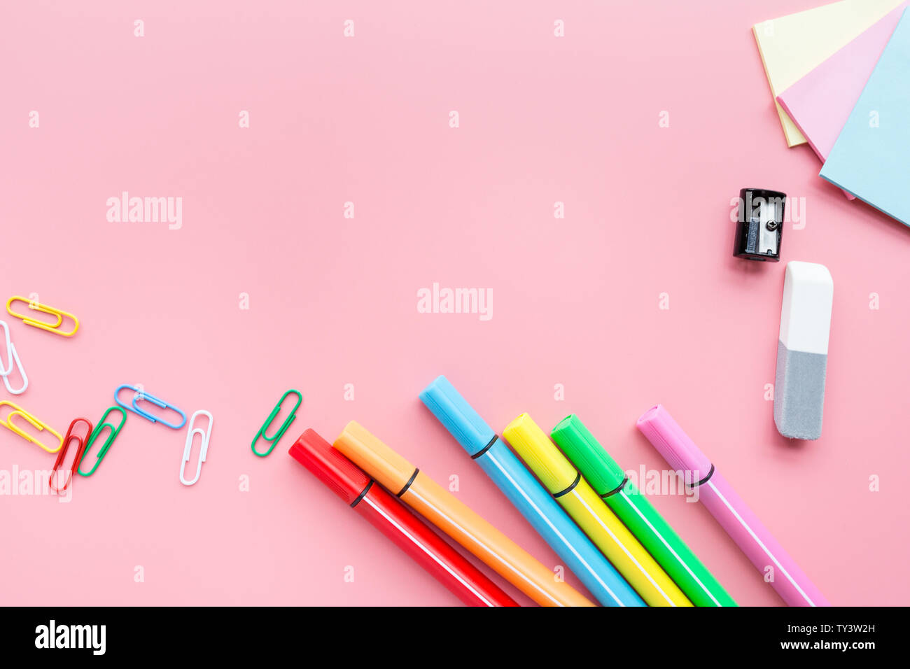 Orange back to school flat lay with bright stationery. School supplies ...
