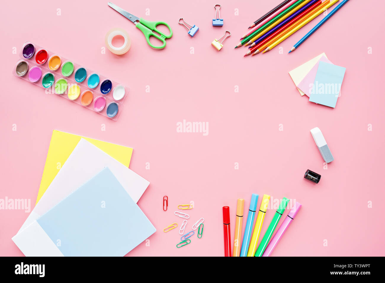 Orange back to school flat lay with bright stationery. School supplies ...