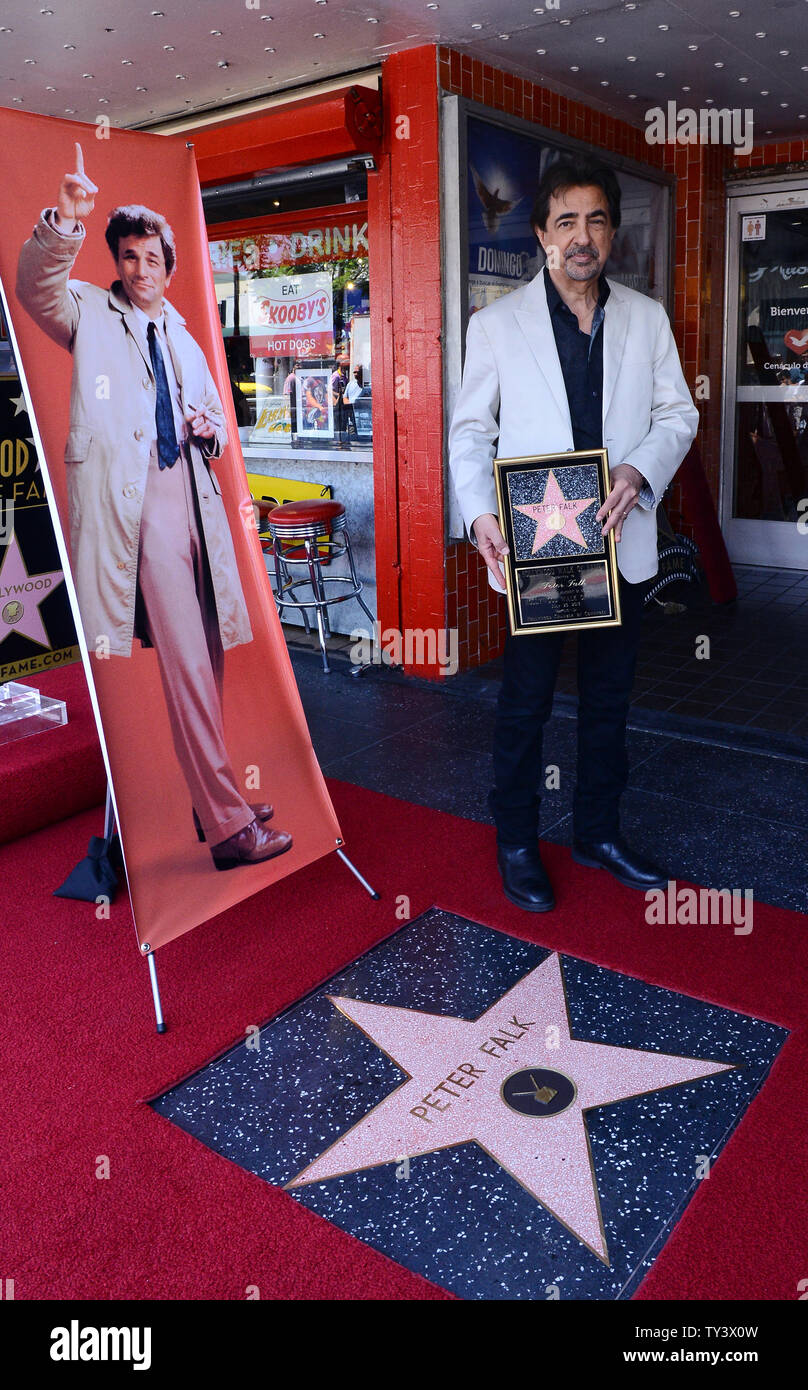 Actor Joe Mantegna holds Peter Falk's replica plaque, who received a ...