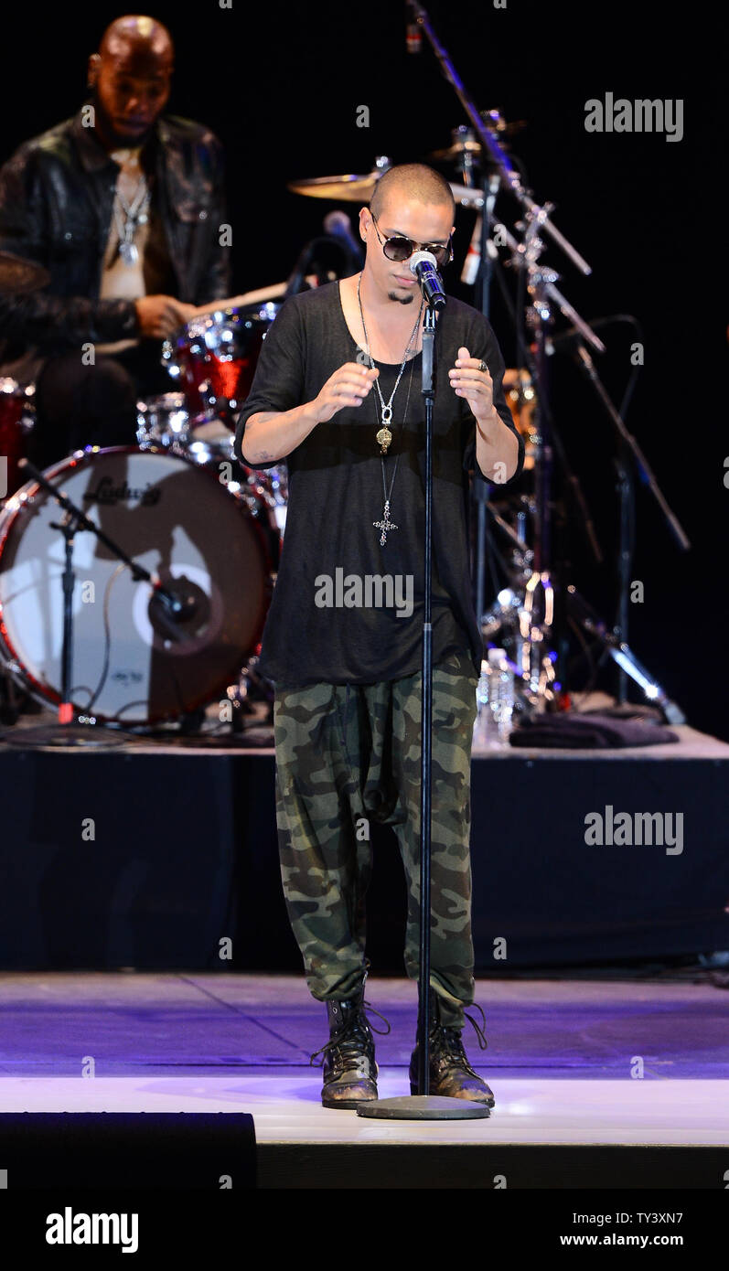 Evan Ross, the son of singer Diana Ross performs before his mother ...