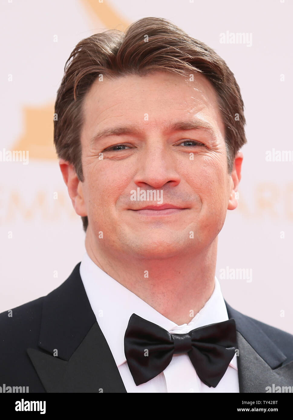 Actor Nathan Fillion arrives for the 65th Primetime Emmy Awards at ...