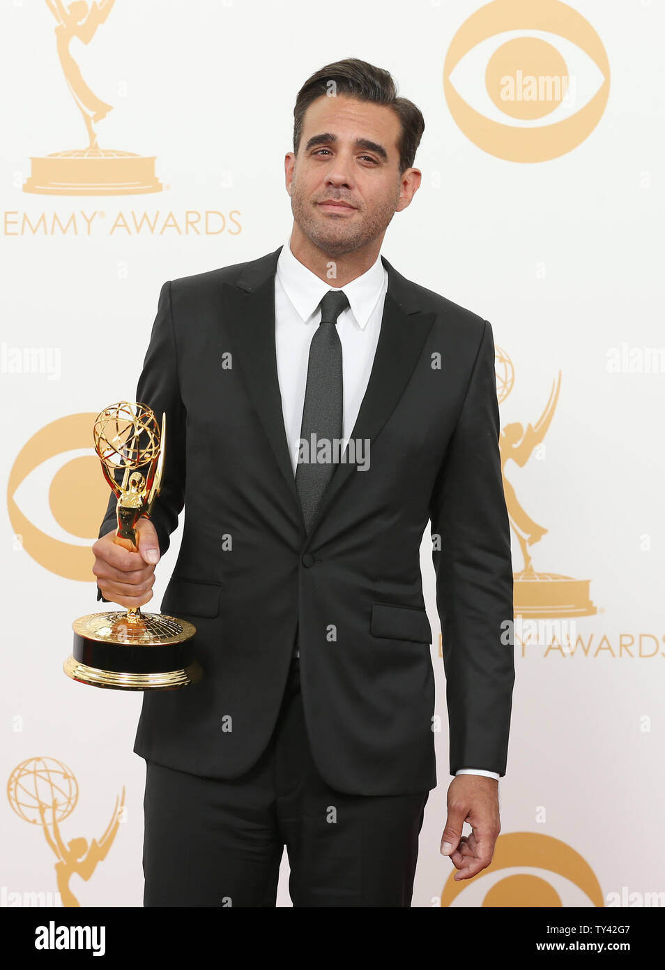 Actor Bobby Cannavale holds the award he won for "Supporting Actor in a ...