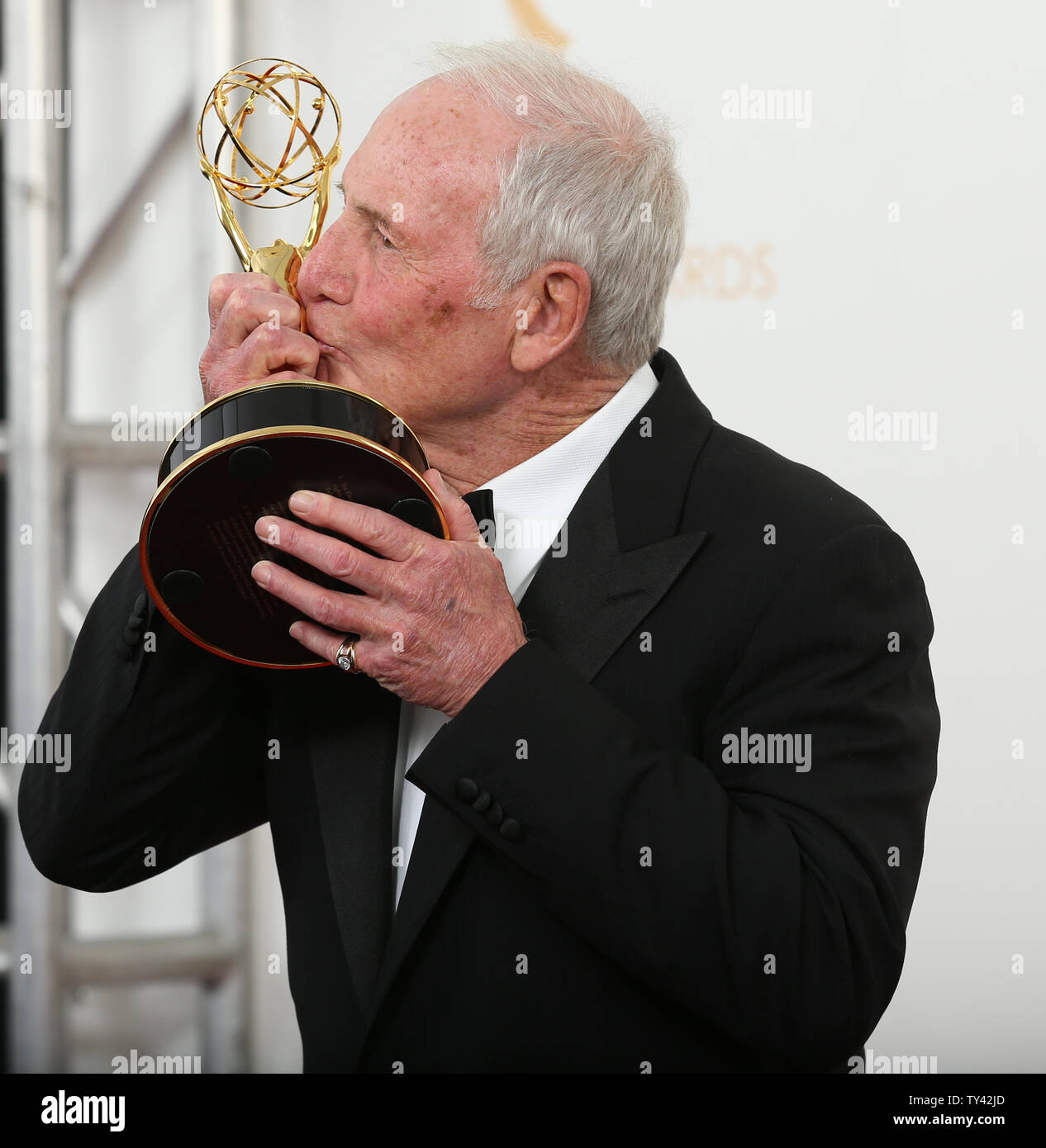 Executive producer Jerry Weintraub holds the award he won for ...