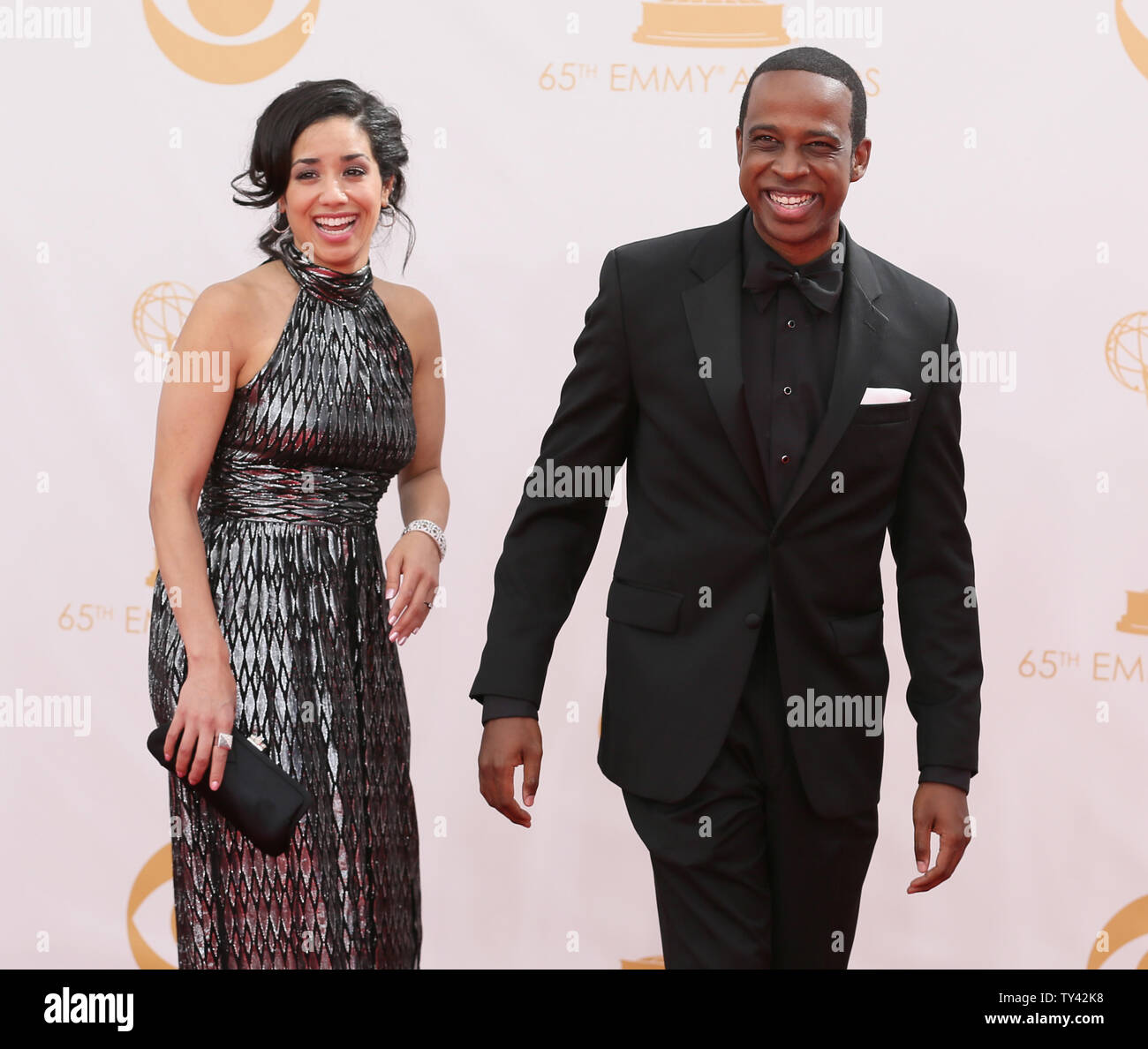 Actor Keith Powell (R) and Jill Knox arrive for the 65th Primetime Emmy ...