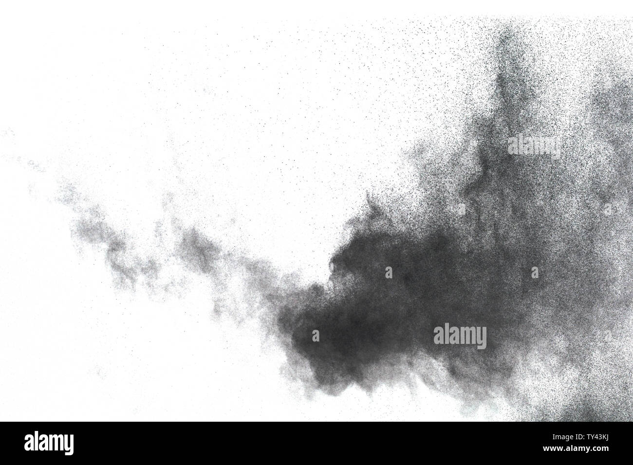 Black particles splattered on white background. Black powder dust ...