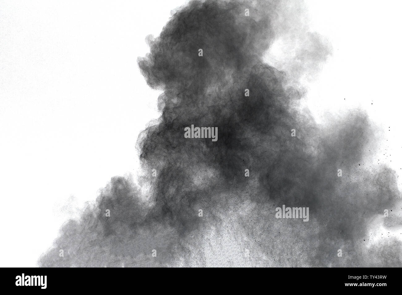 Black particles splattered on white background. Black powder dust ...
