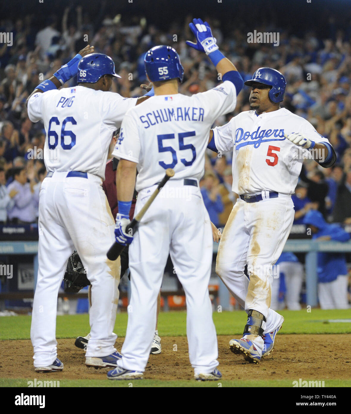 Los Angeles Dodgers third baseman Juan Uribe (5) hits a two run homerun ...