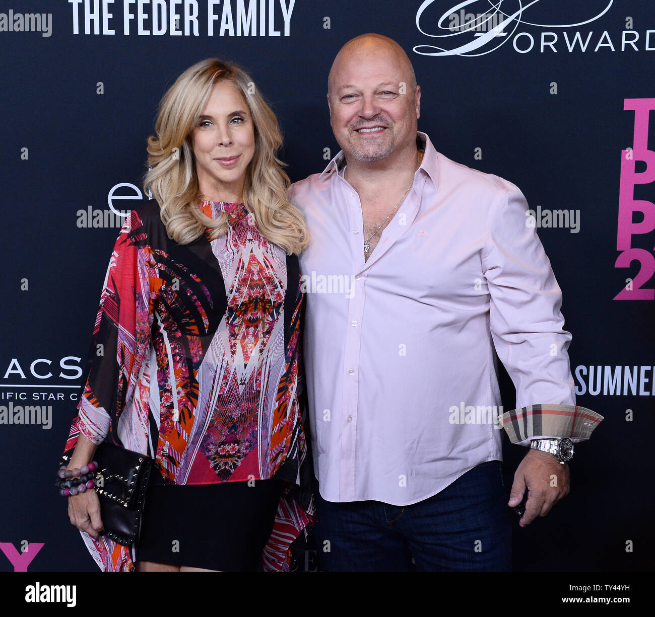 Actor Michael Chiklis and his wife Michelle Chiklis arrive for Elyse ...