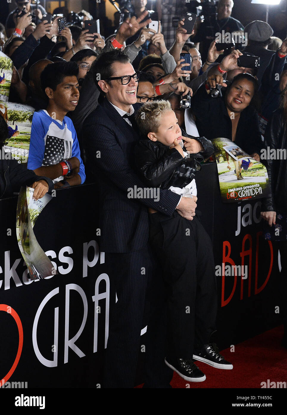 Cast members Johnny Knoxville and Jackson Nicoll attend the premiere of ...