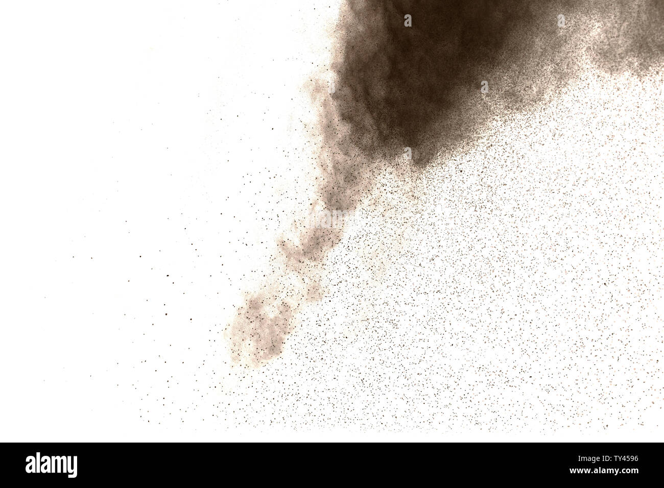 Black particles splattered on white background. Black powder dust ...