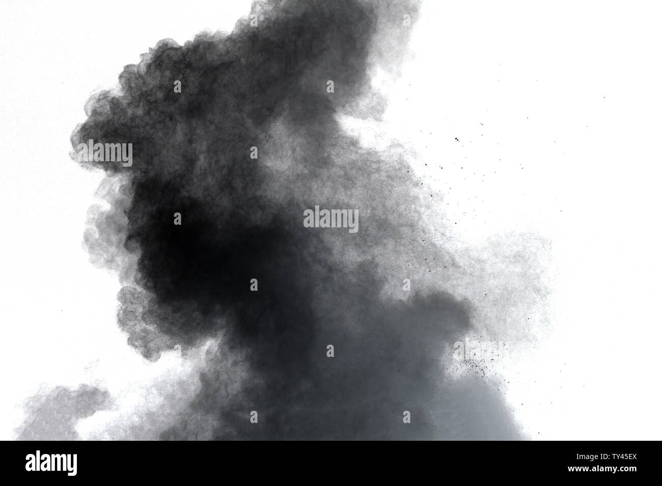 Black particles splattered on white background. Black powder dust ...