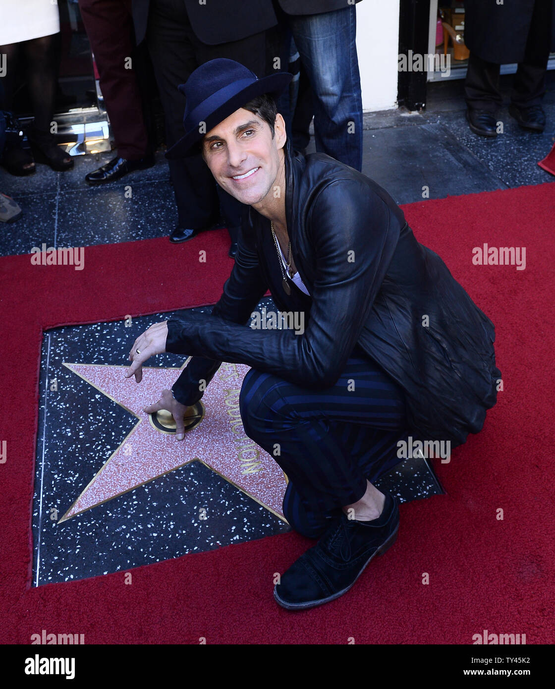 Perry Farrell, lead singer in the rock band Jane's Addiction touches ...