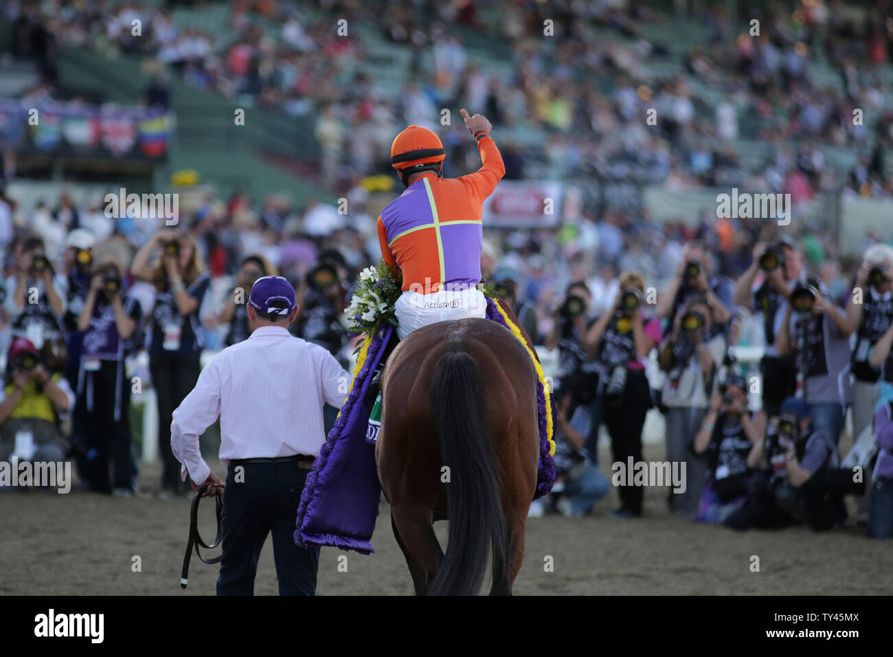 Jockey Gary Stevens celebrates aboard Beholder after winning the ...