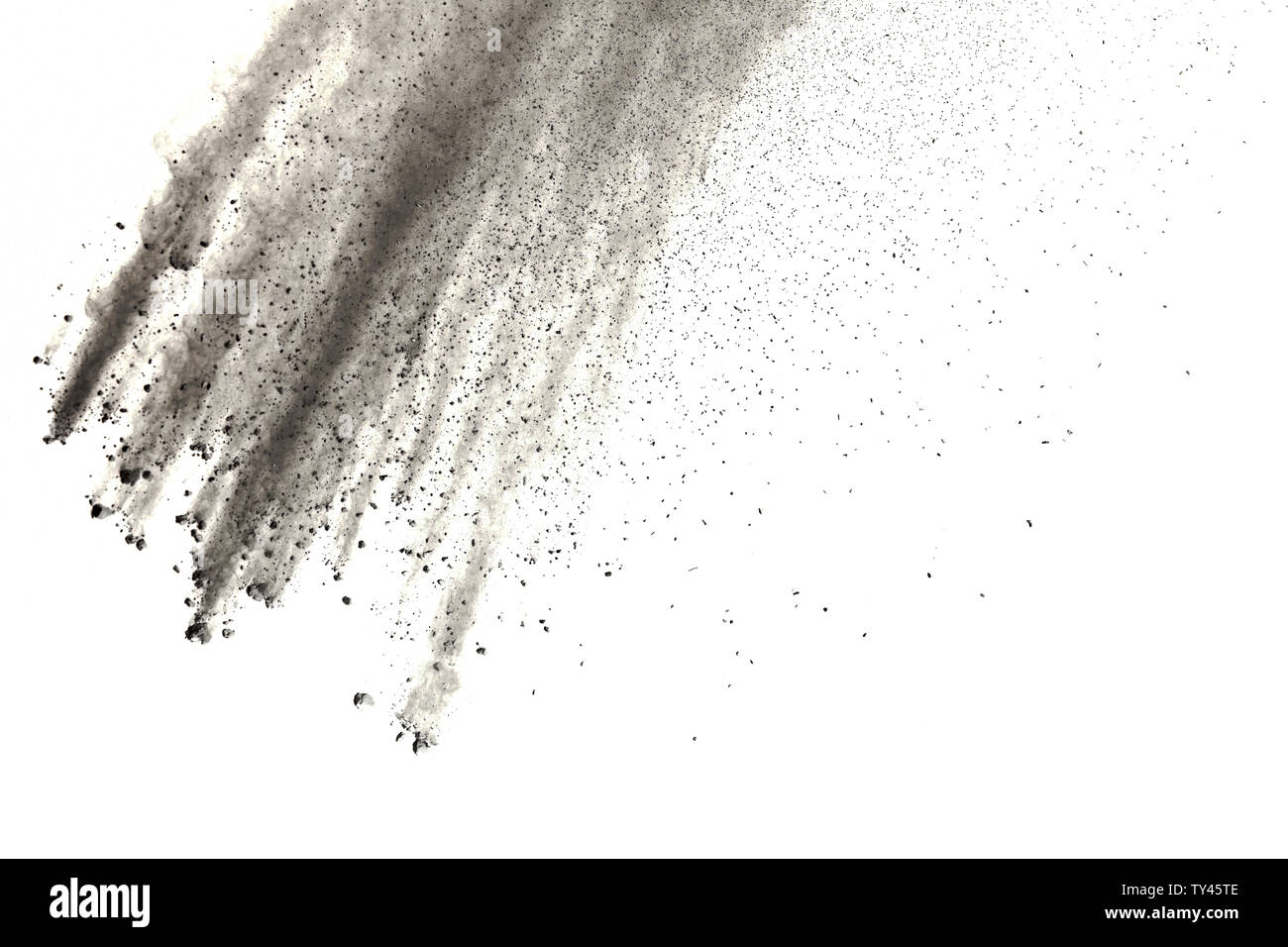 Black particles splattered on white background. Black powder dust ...