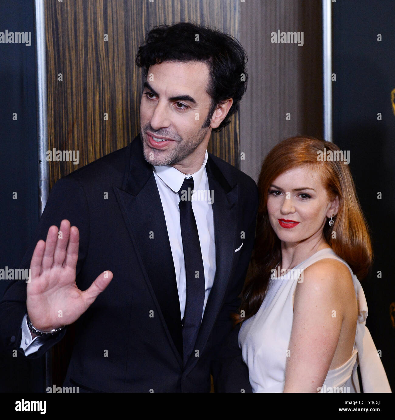 Actor Sacha Baron Cohen and his wife, actress Isla Fisher attend the ...
