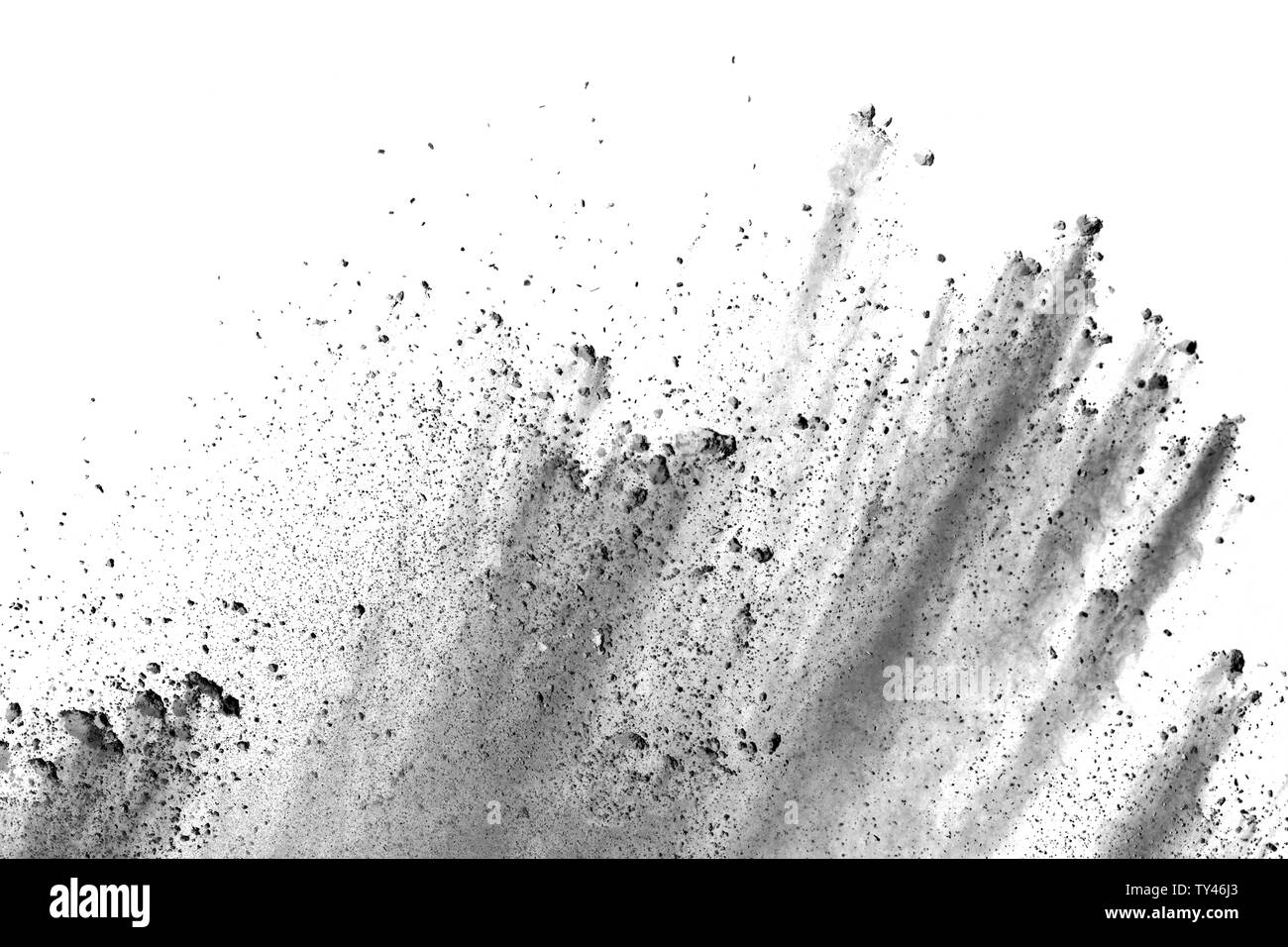 Black particles splattered on white background. Black powder dust ...