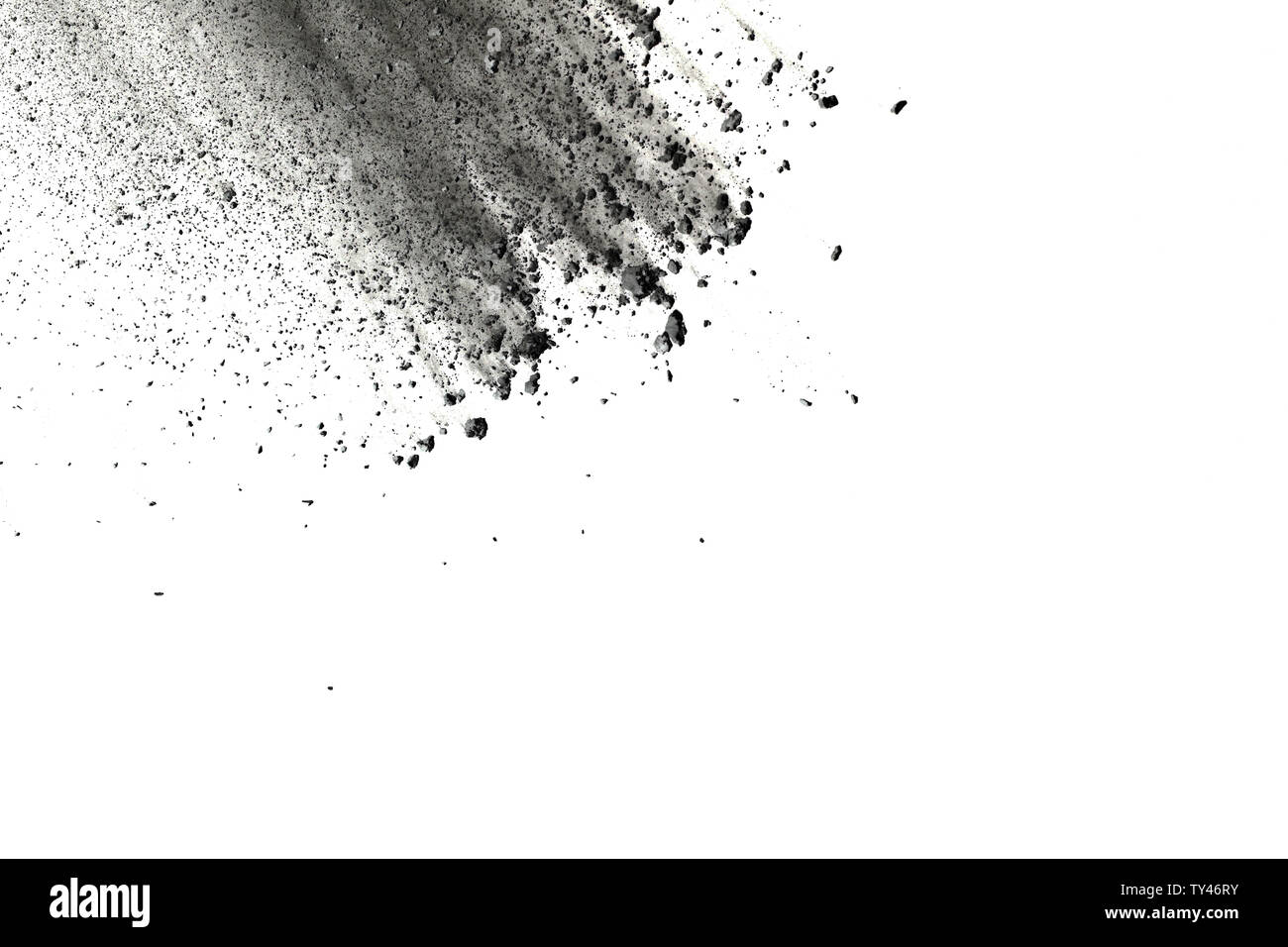 Black particles splattered on white background. Black powder dust ...