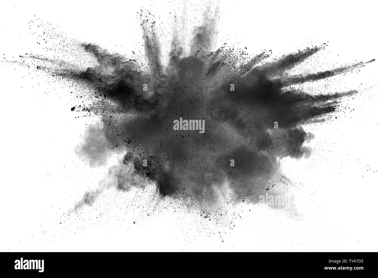 Black particles splattered on white background. Black powder dust ...