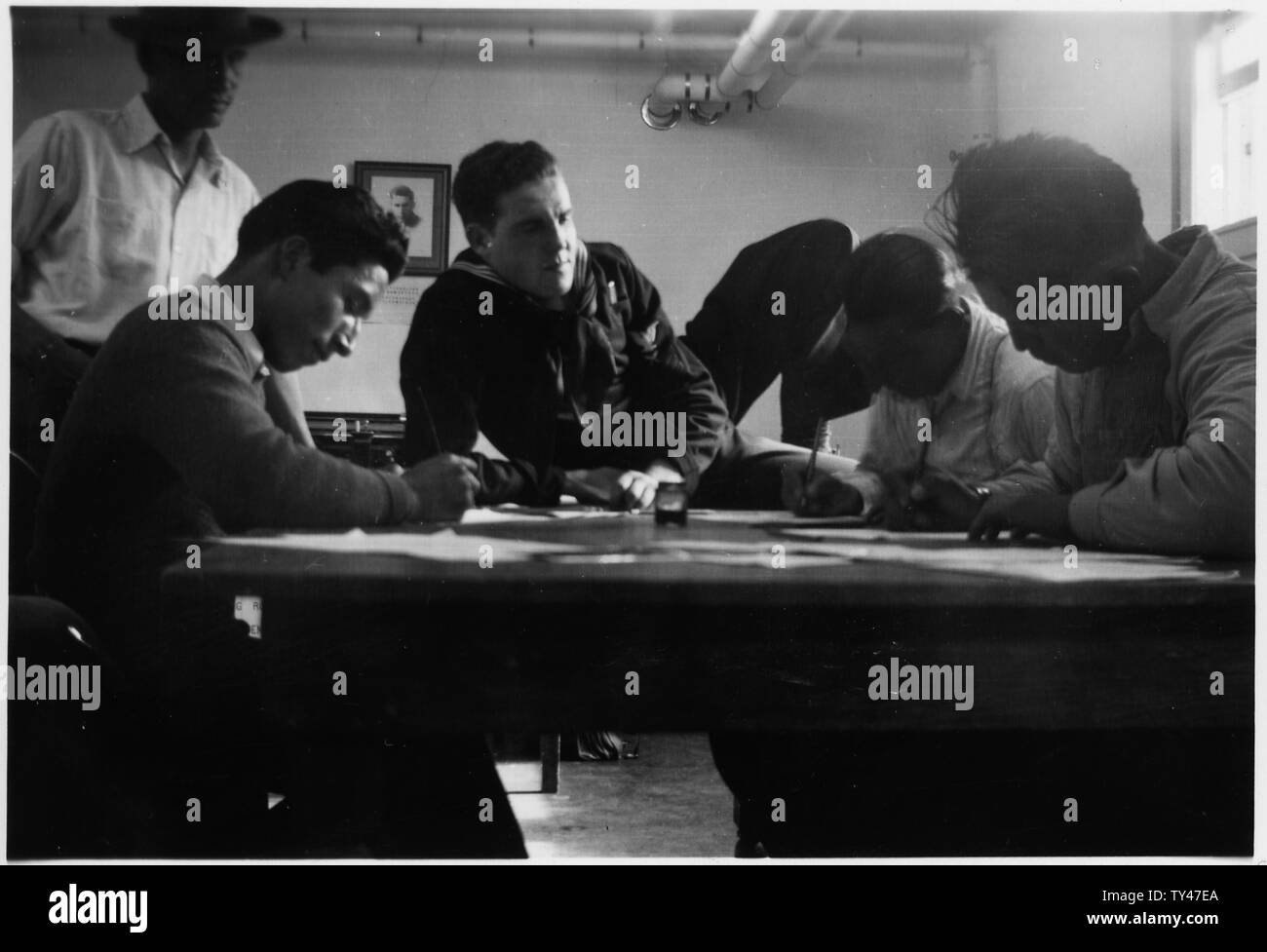 Filling out forms for enlistment in the Navy Stock Photo - Alamy