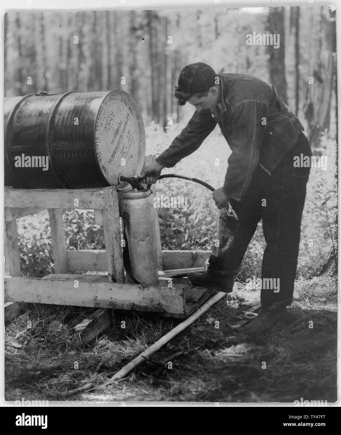 Filling spray tank at field supply station Stock Photo - Alamy