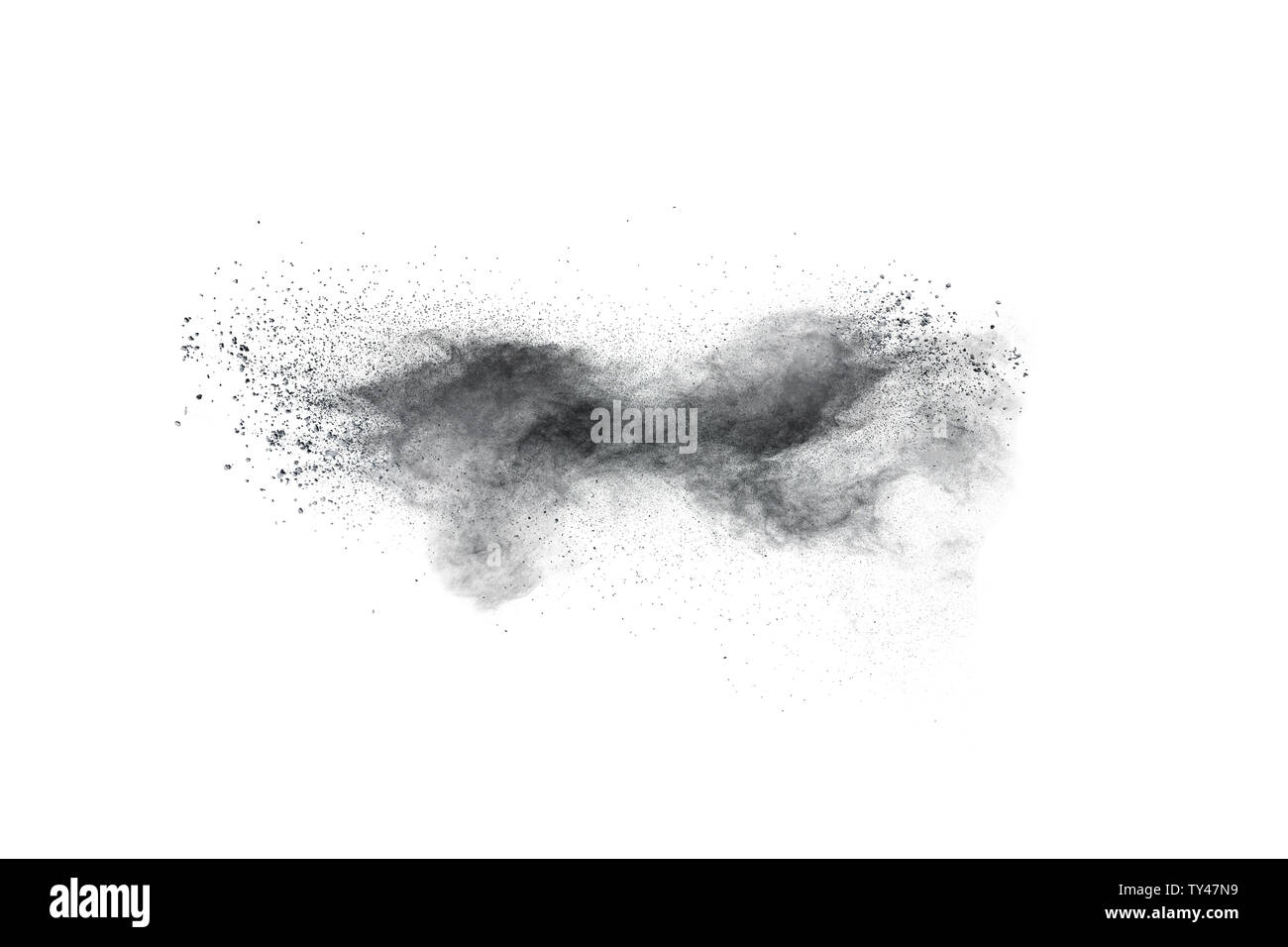 Black particles splattered on white background. Black powder dust ...