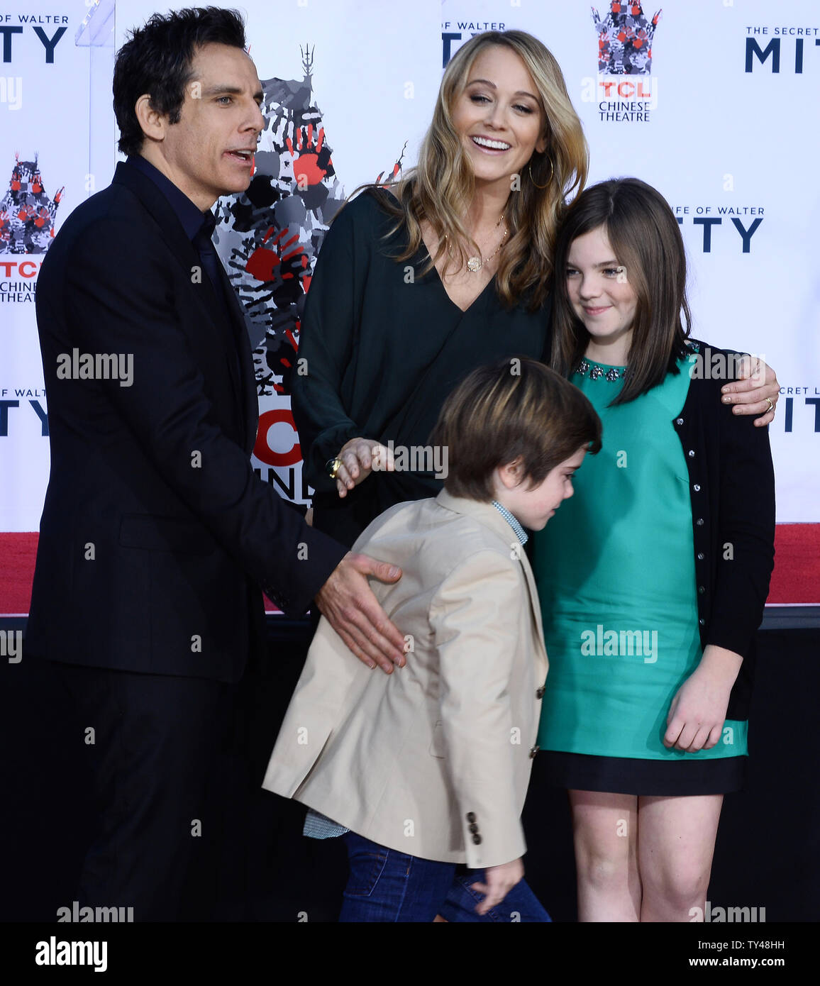 Quinlin Stiller (L), the son of actor Ben Stiller walks away from a ...