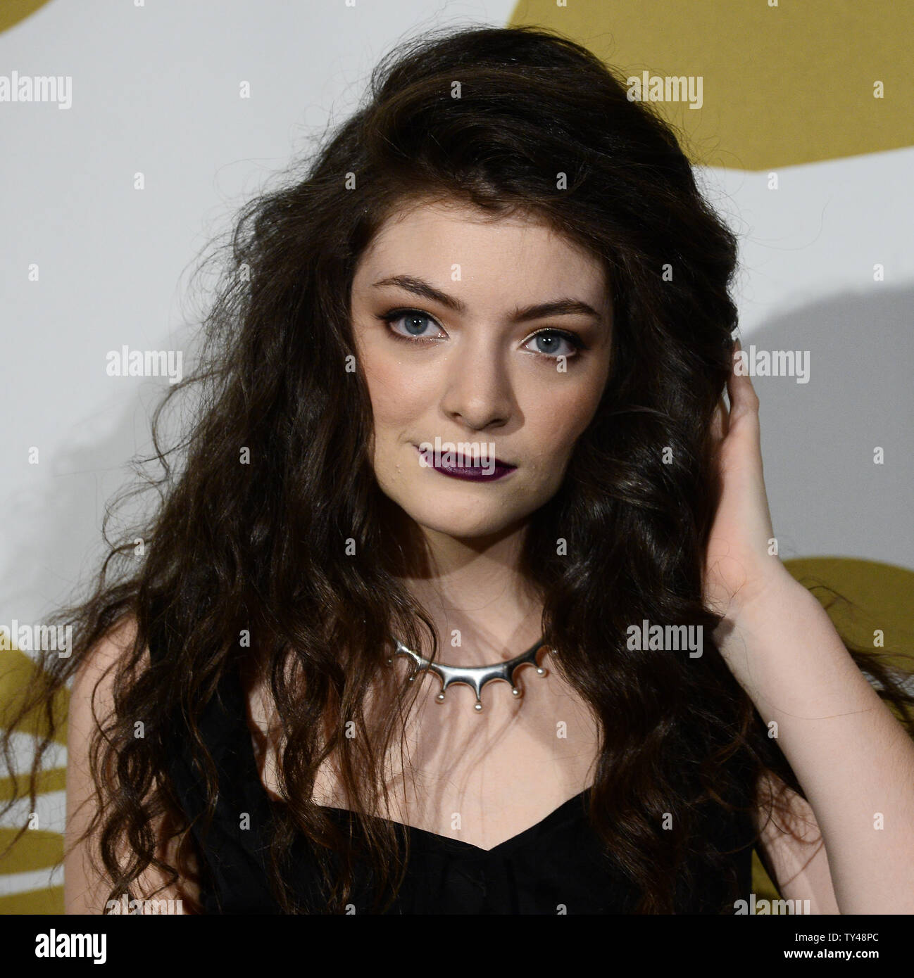 Singer Lorde appears in the press room during Grammy Nominations ...