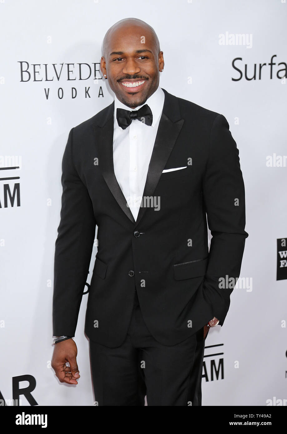 Dolvett Quince arrives on the red carpet during the 2013 amfAR ...