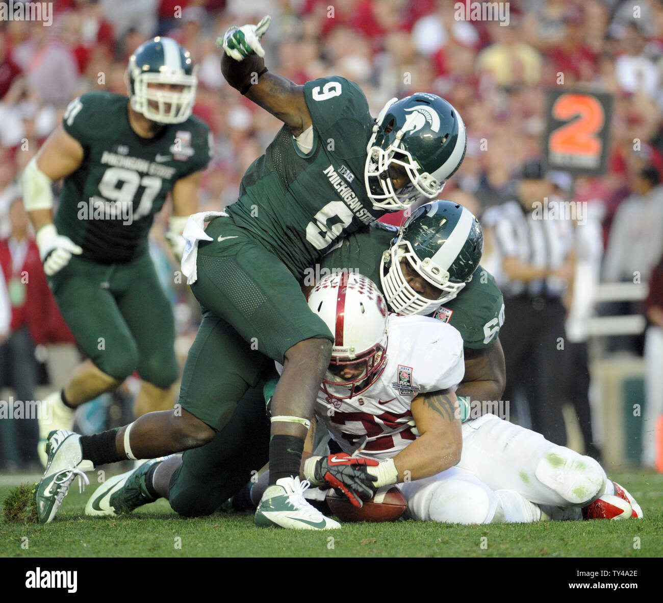 Stanford Cardinal running back Tyler Gaffney, on ground, is stopped for ...
