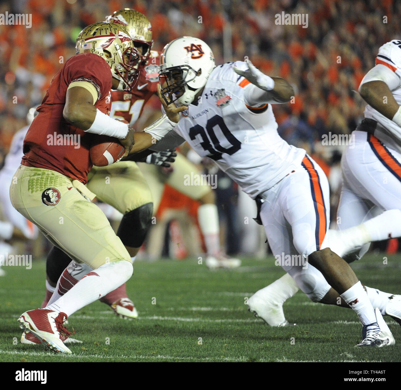 Auburn Tigers defensive end Dee Ford (30) sacks Florida State Seminoles ...