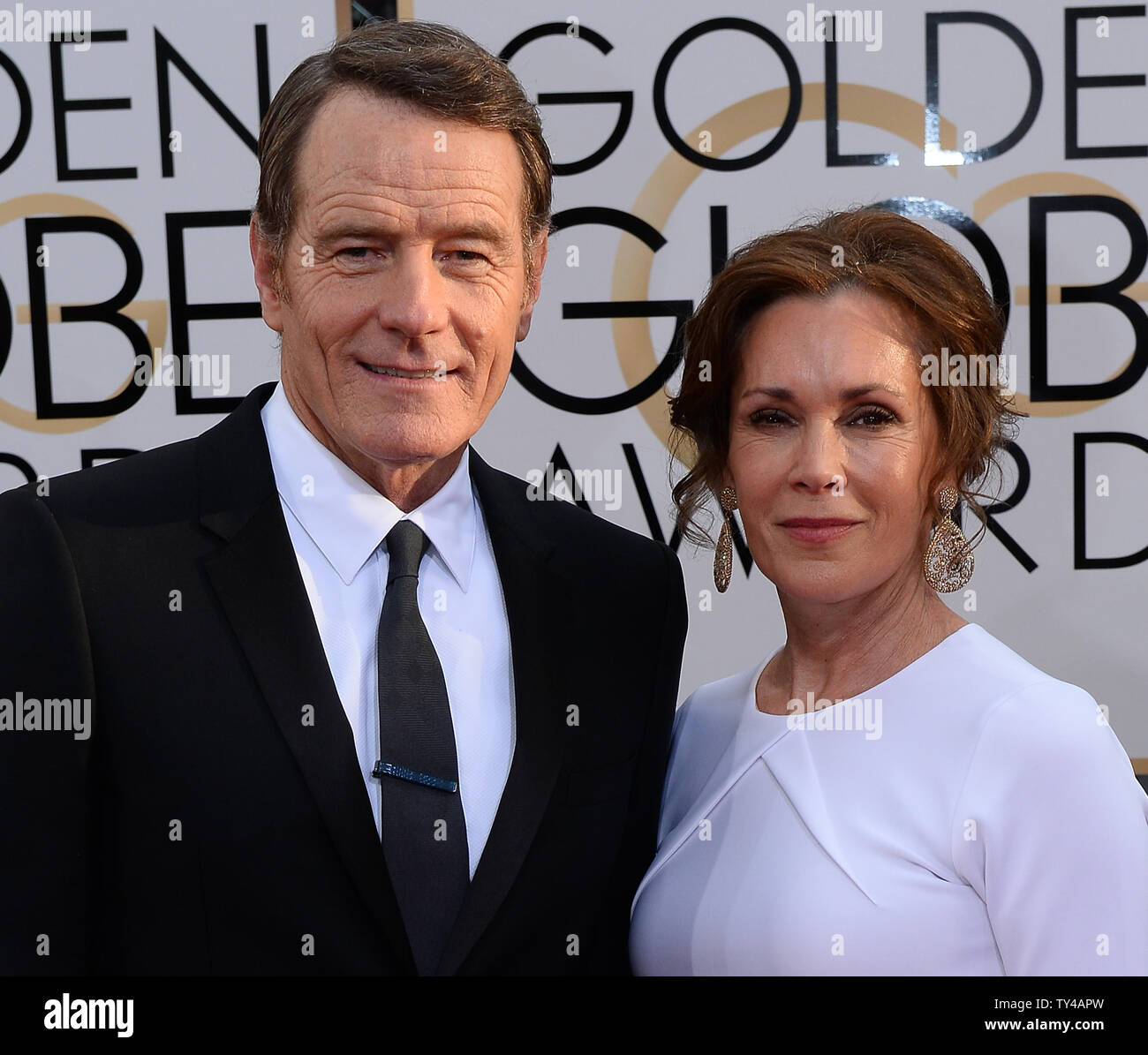 Actor Bryan Cranston (L) and actress Robin Dearden arrive for the 71st ...