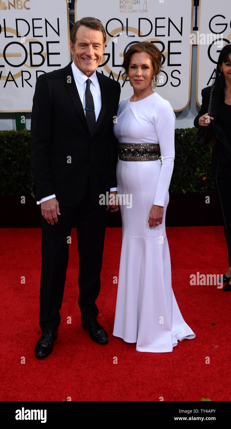 Actor Bryan Cranston (L) and actress Robin Dearden arrive for the 71st ...