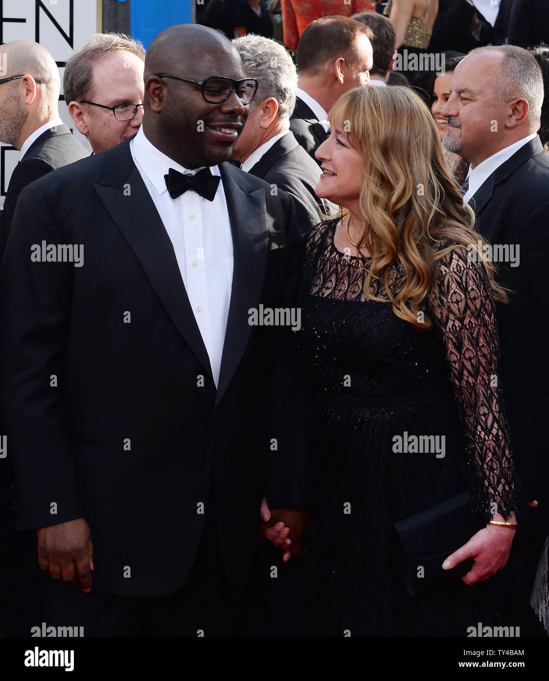 Director Steve McQueen (L) and his partner Bianca Stigter arrive for ...