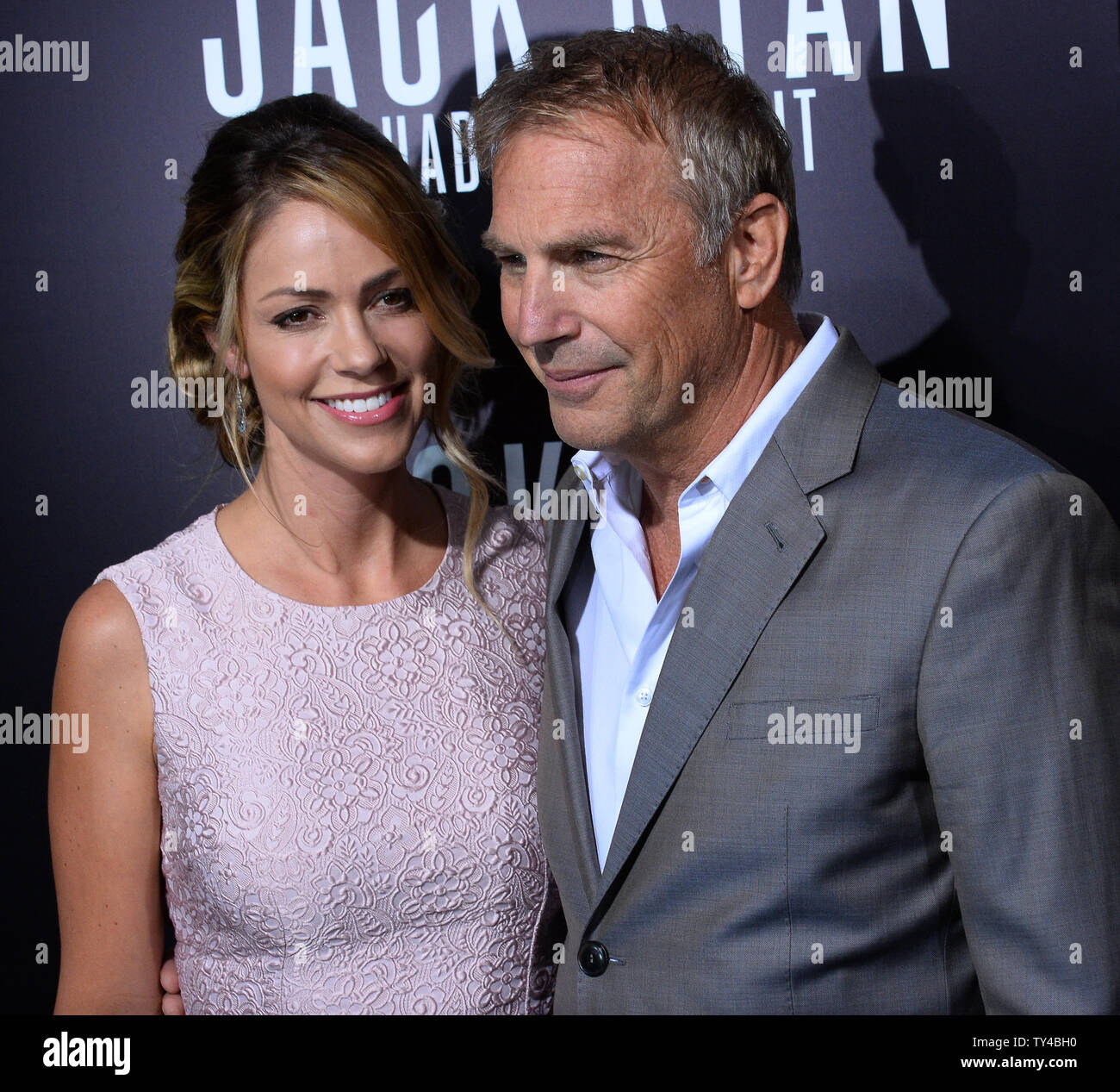 Cast member Kevin Costner and his wife Christine Baumgartner attend the ...