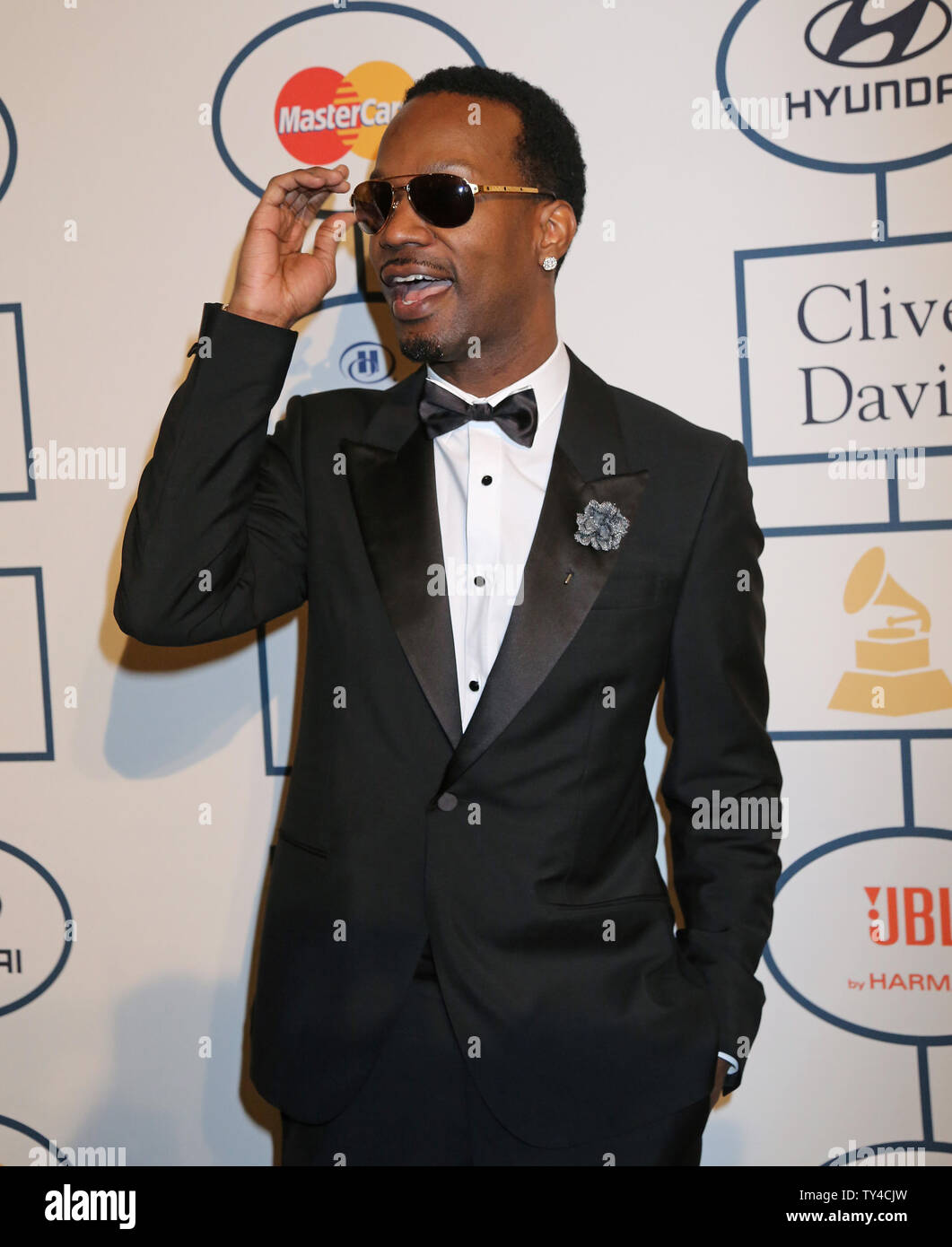 Juicy J arrives on the red carpet before the annual Clive Davis Pre ...