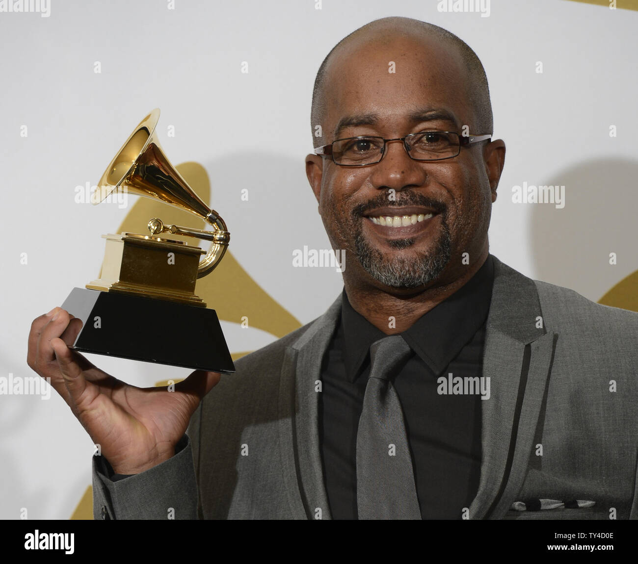 Darius Rucker holds his Grammy Award for Best Country Solo Performance ...