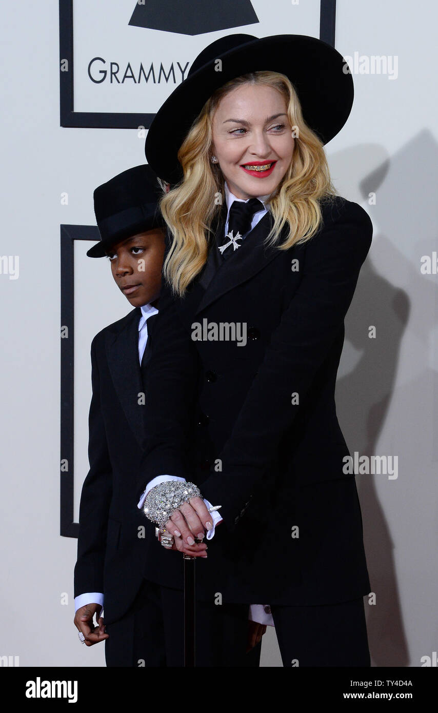 Singer-songwriter Madonna (R) and her son David Banda Mwale arrive for ...