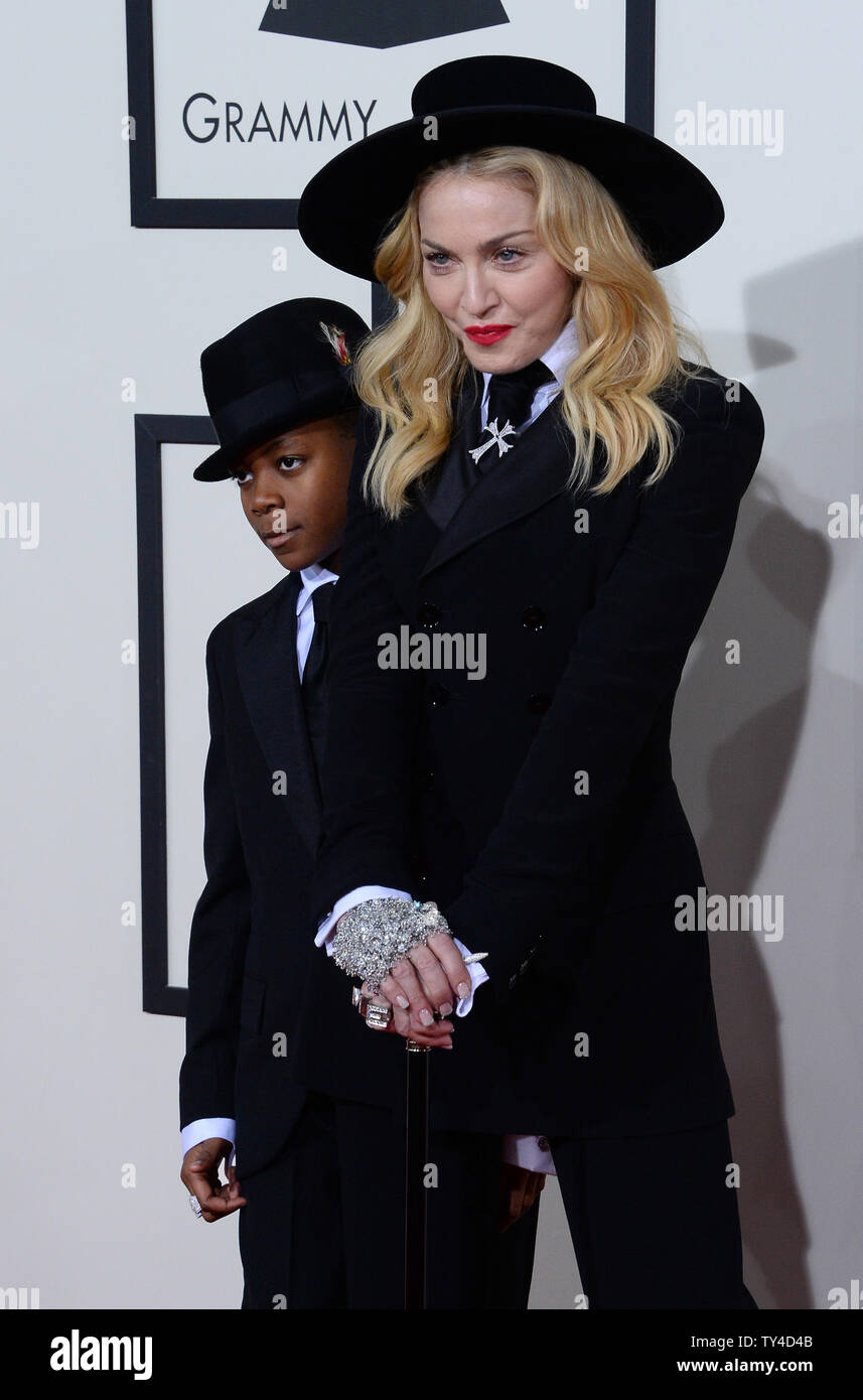 Singer-songwriter Madonna (R) and her son David Banda Mwale arrive for ...