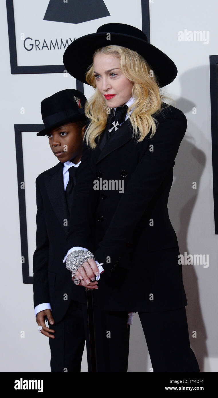 Singer-songwriter Madonna (R) and her son David Banda Mwale arrive for ...