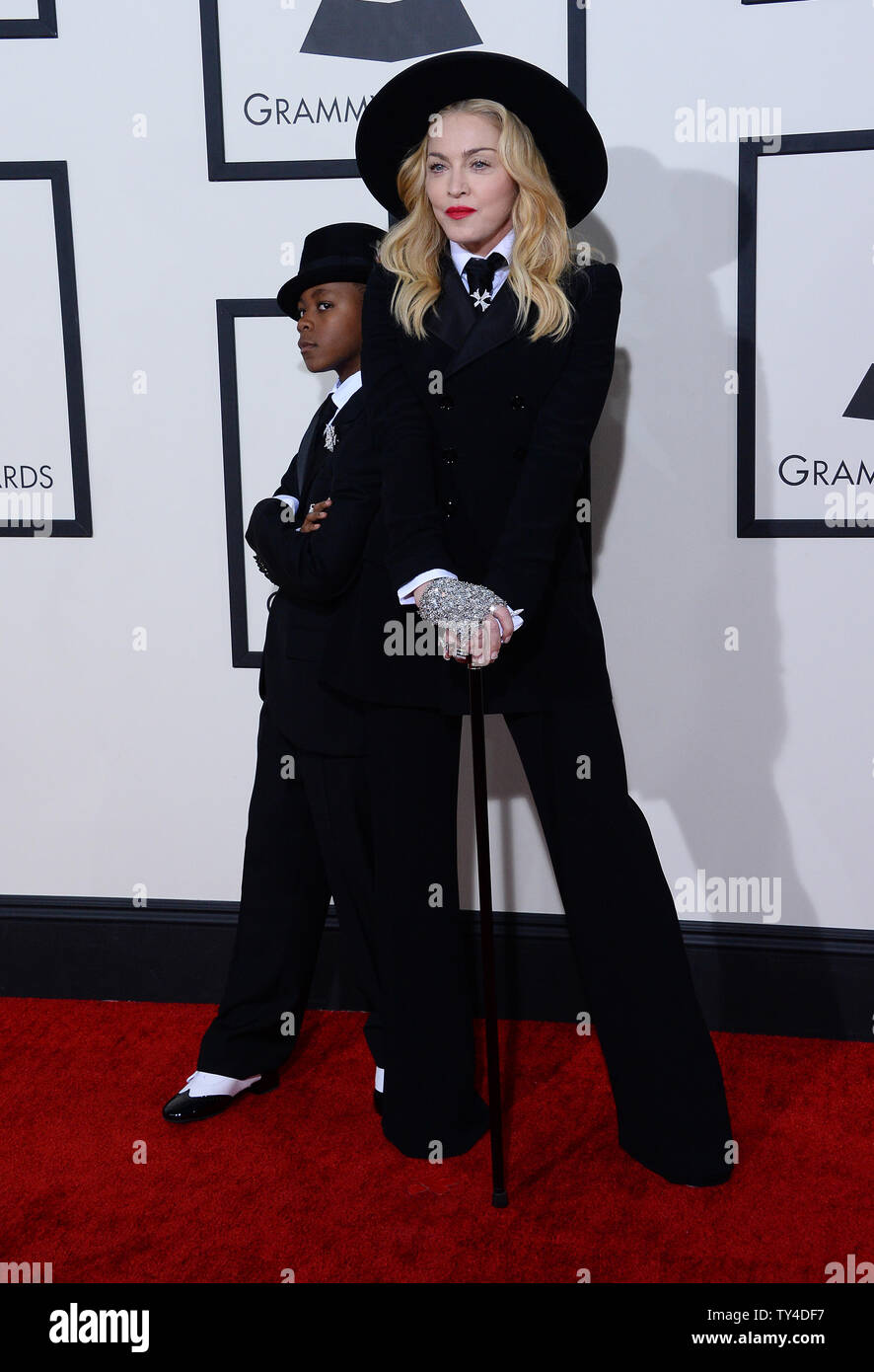 Singer-songwriter Madonna (R) and her son David Banda Mwale arrive for ...