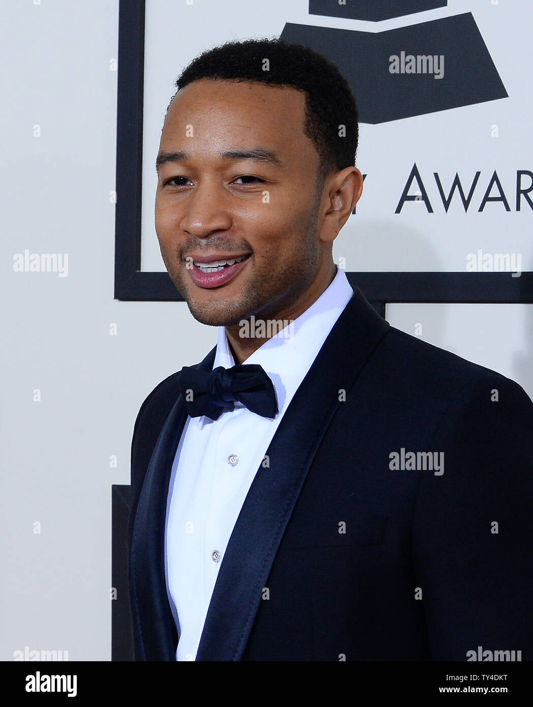 Recording artist John Legend arrives for the 56th annual Grammy Awards ...