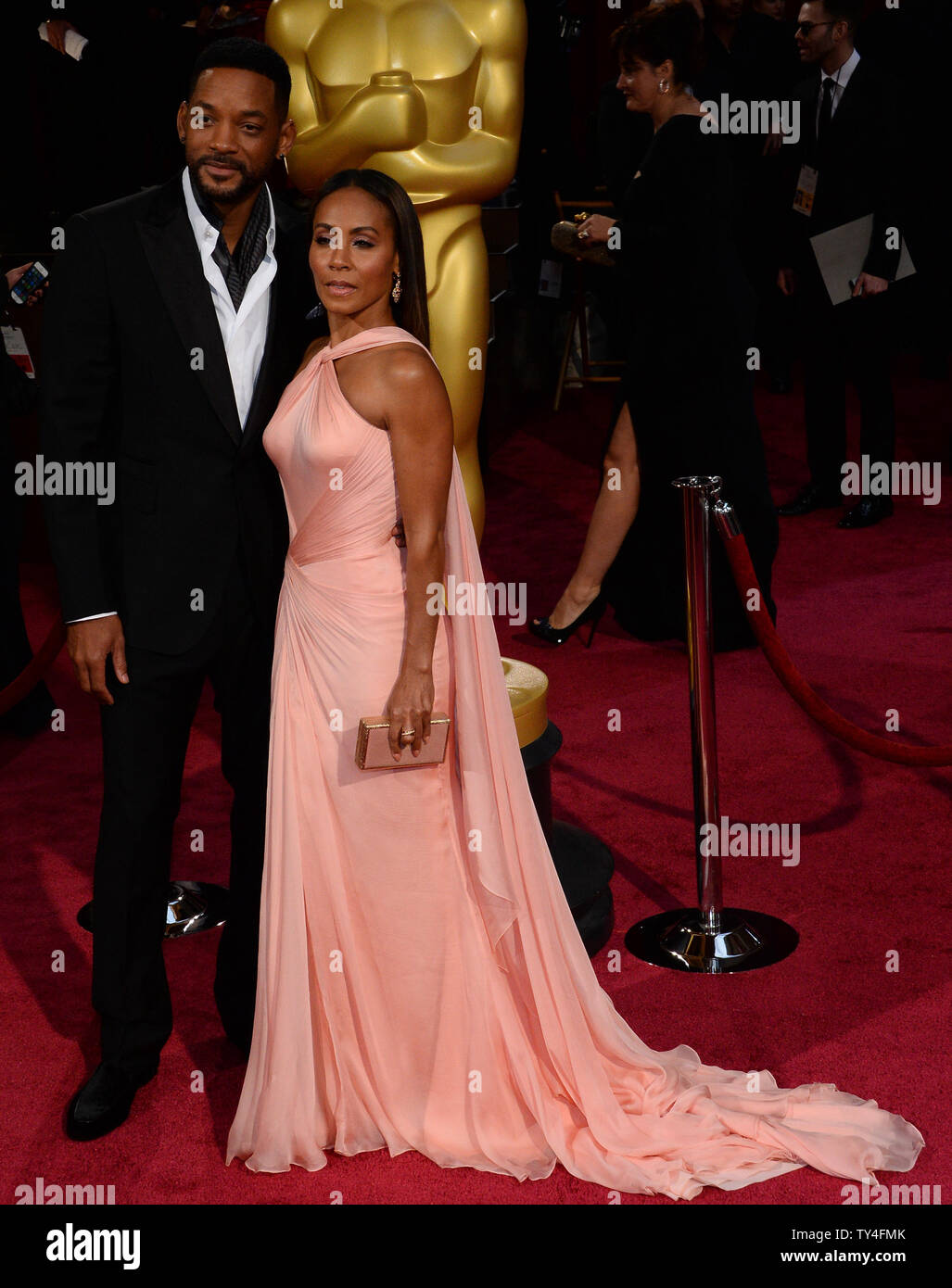 Actors Will Smith (L) and Jada Pinkett Smith arrive on the red carpet ...