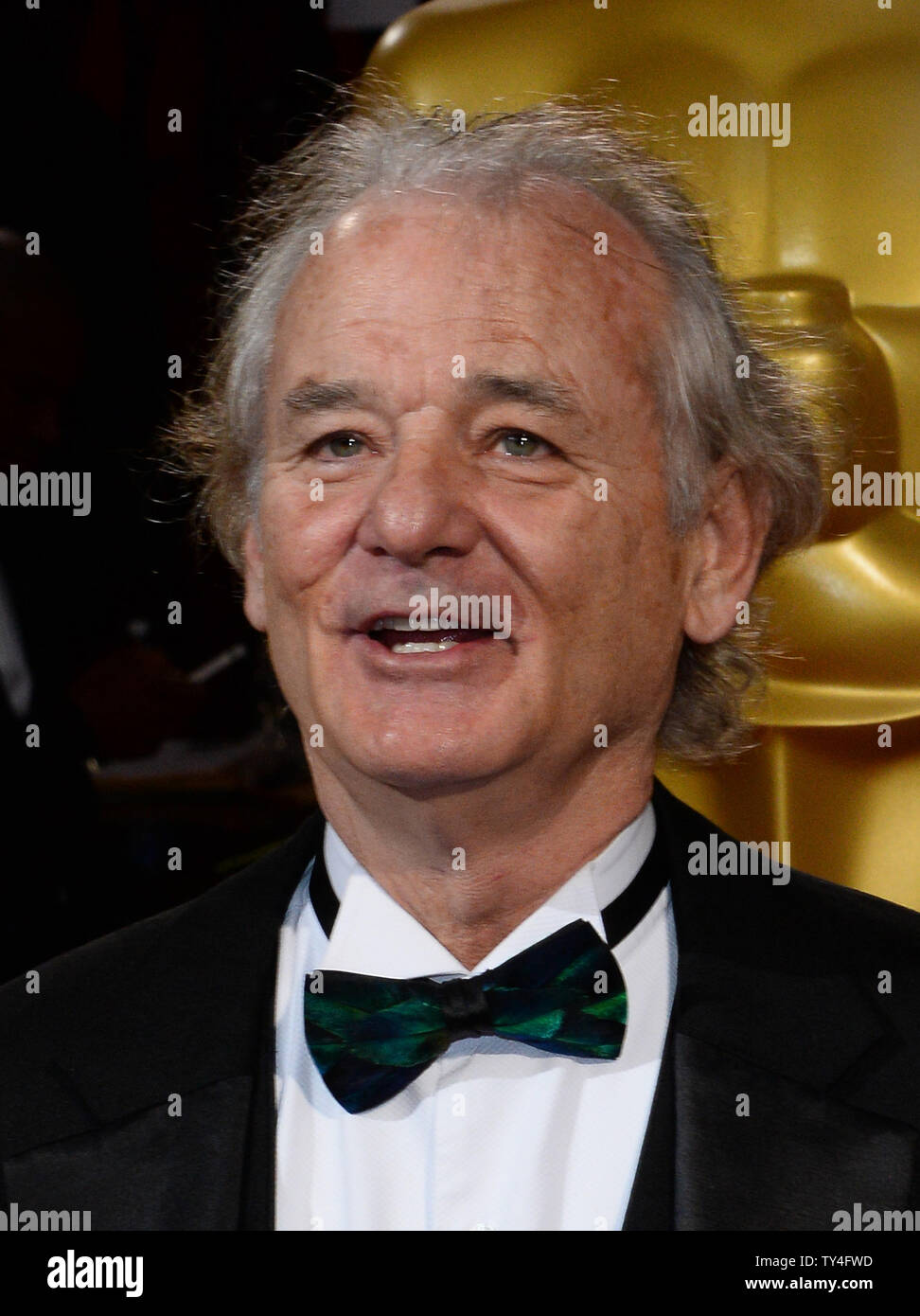 Actor Bill Murray arrives on the red carpet at the 86th Academy Awards ...