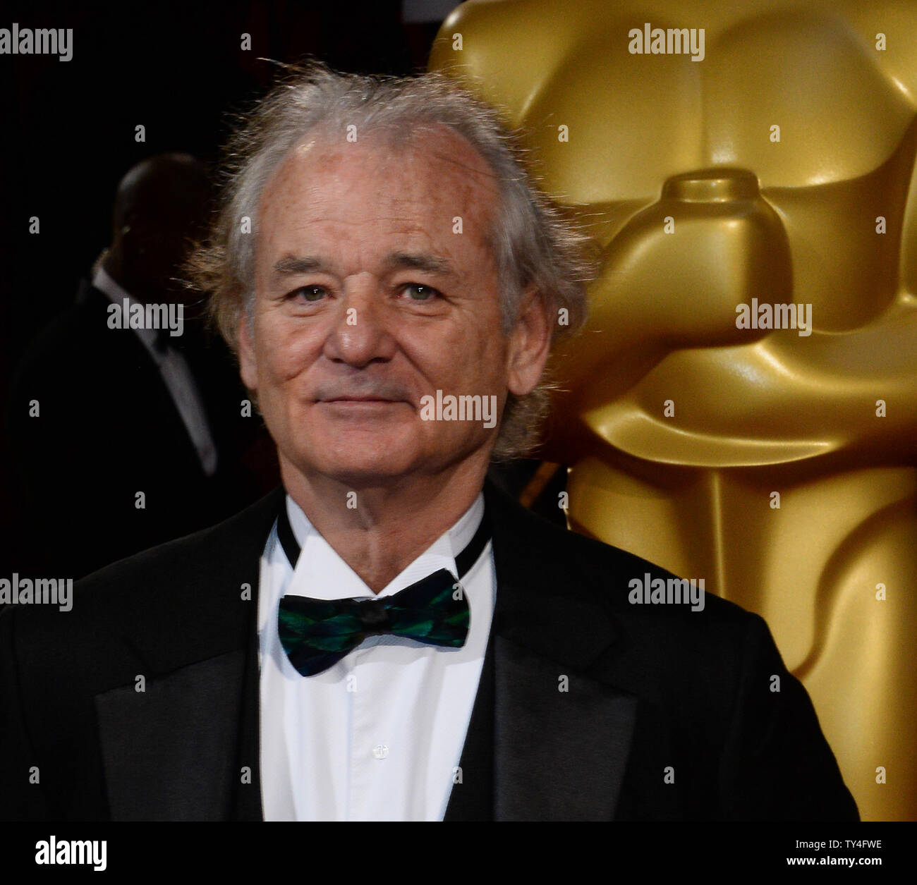 Actor Bill Murray arrives on the red carpet at the 86th Academy Awards ...