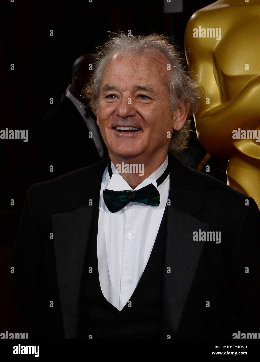 Actor Bill Murray arrives on the red carpet at the 86th Academy Awards ...