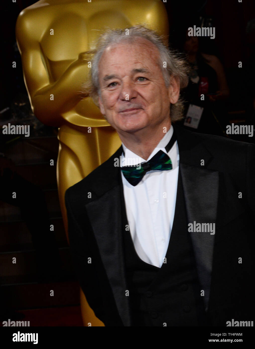 Actor Bill Murray arrives on the red carpet at the 86th Academy Awards ...