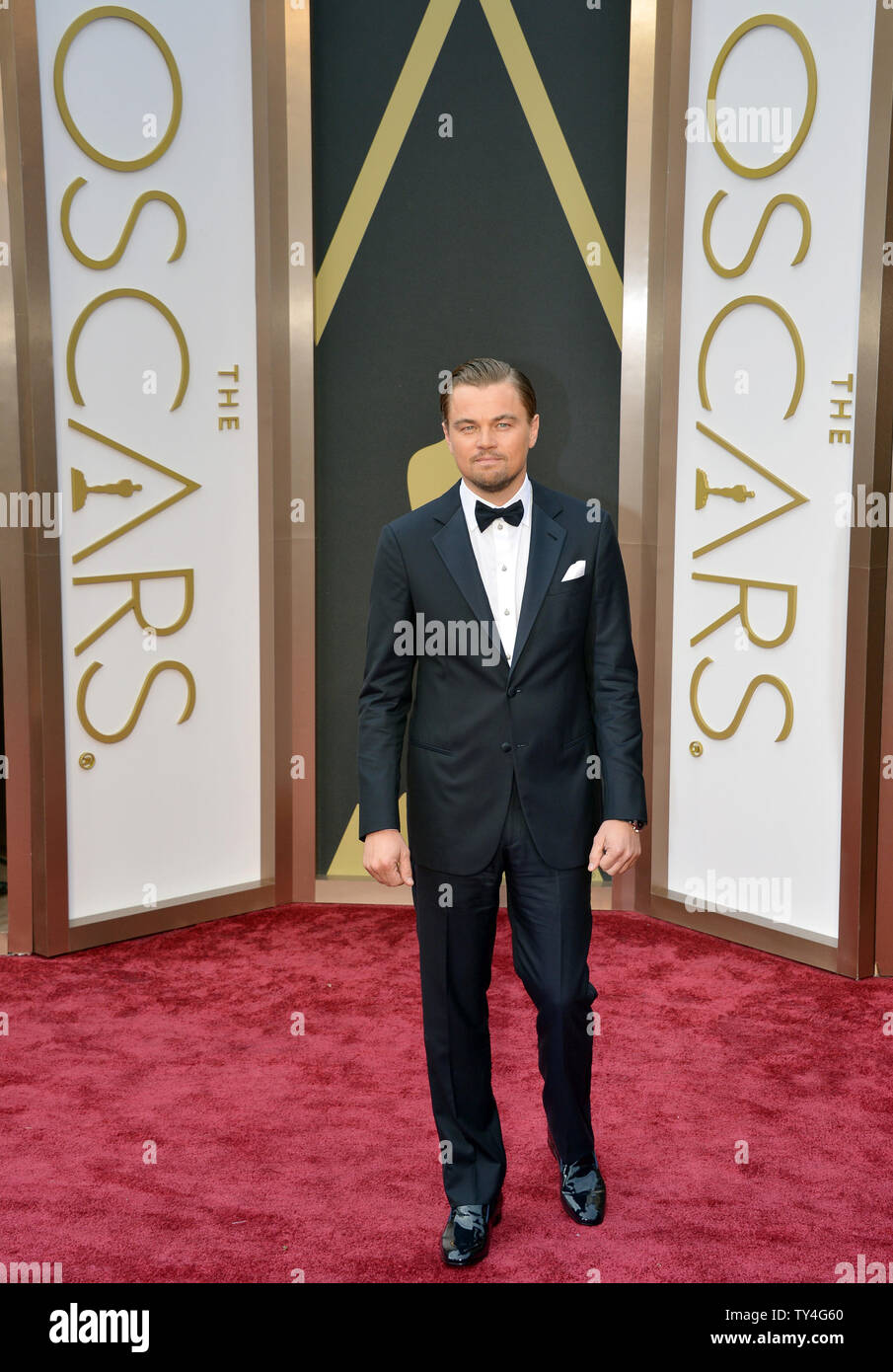 Leonardo DiCaprio arrives on the red carpet at the 86th Academy Awards ...