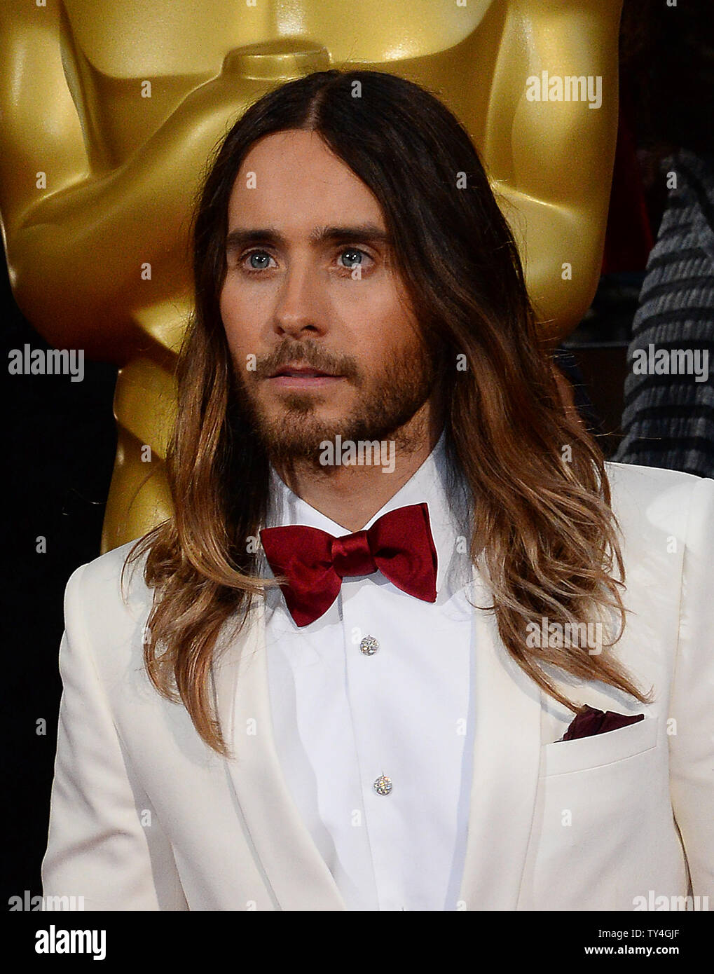 Actor Jared Leto arrives on the red carpet at the 86th Academy Awards ...